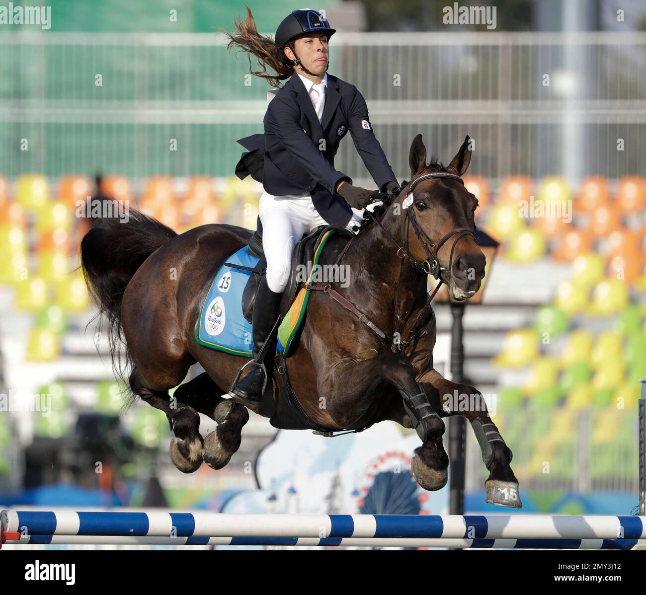 Claudia Cesarini of Italy competes at the equestrian section of the ...