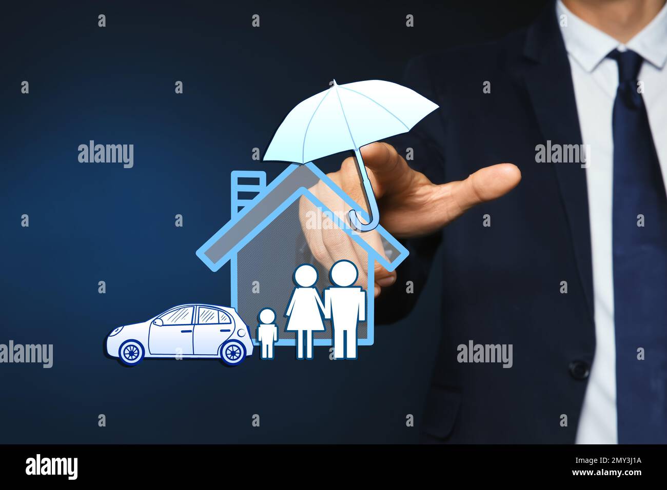 Insurance concept - umbrella demonstrating protection. Man using ...