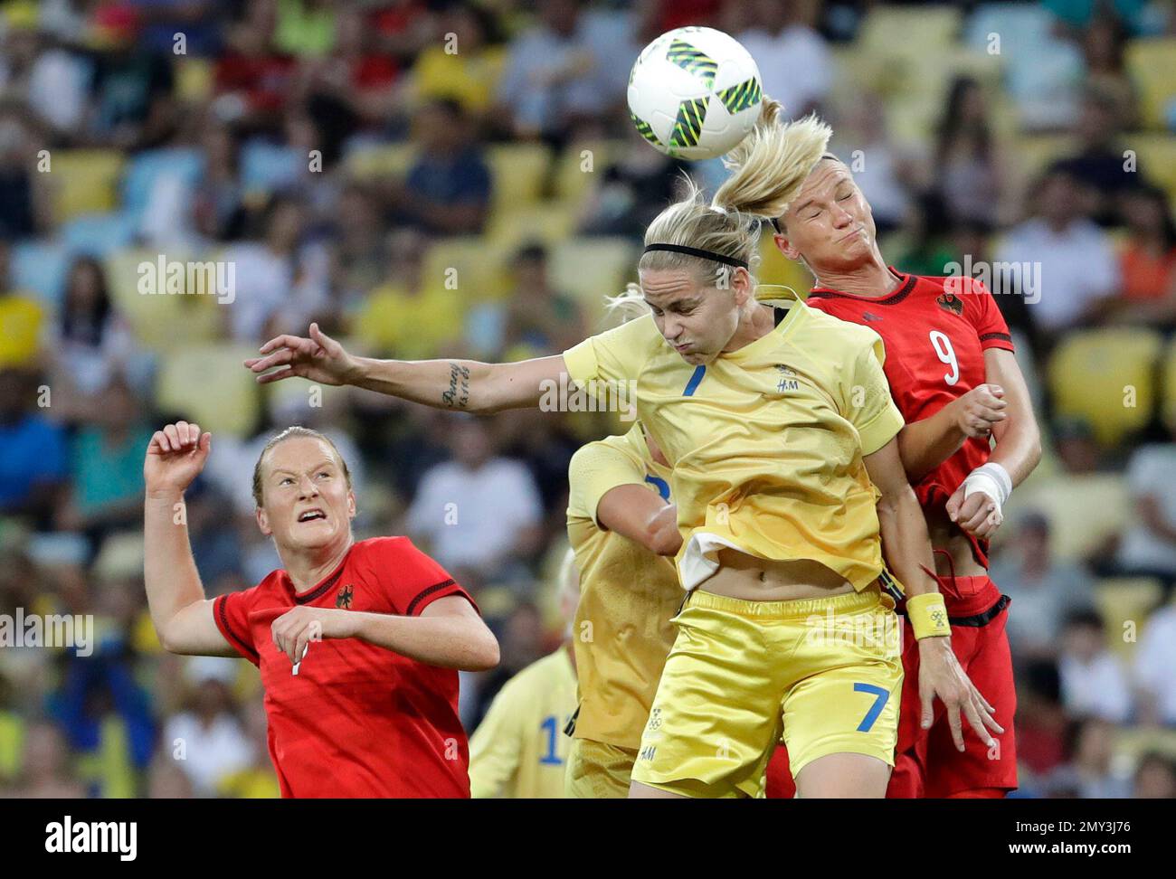 Germany's Alexandra Popp, right, and Sweden's Lisa Dahlkvist go for a ...