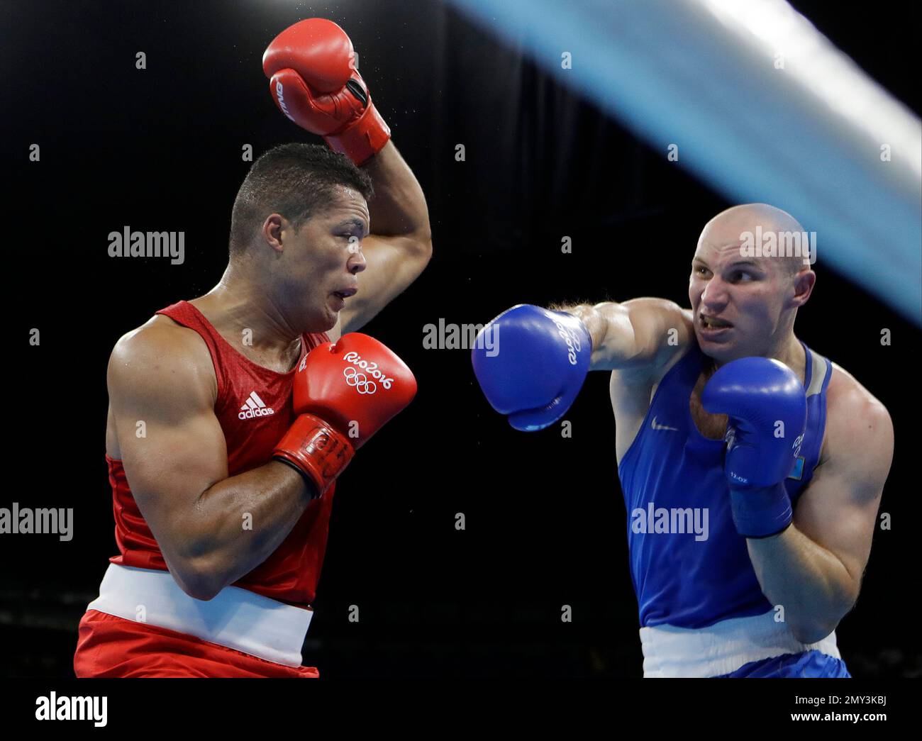 Britain's Joe Joyce, left, and Kazakhstan's Ivan Dychko exchange ...