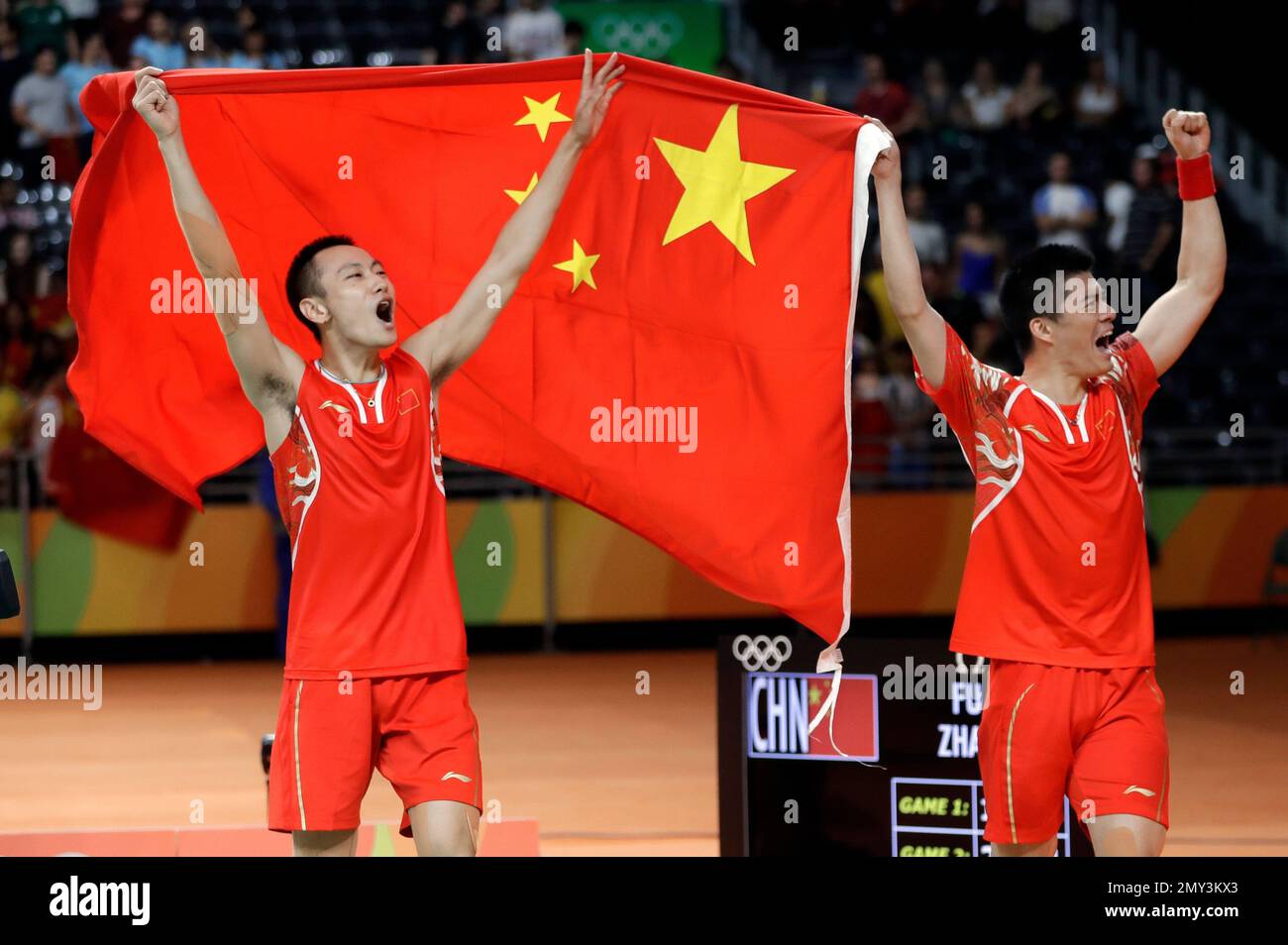 China's Zhang Nan, left, and Fu Haifeng celebrate after defeating ...