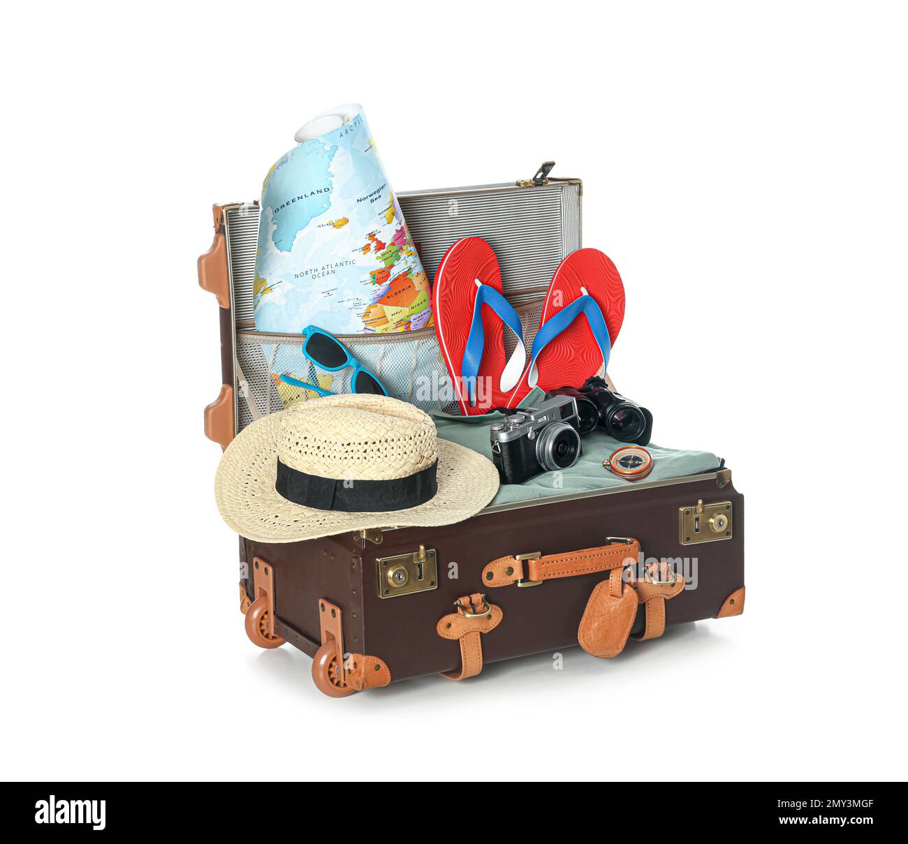 Open vintage suitcase with clothes and beach objects packed for summer ...