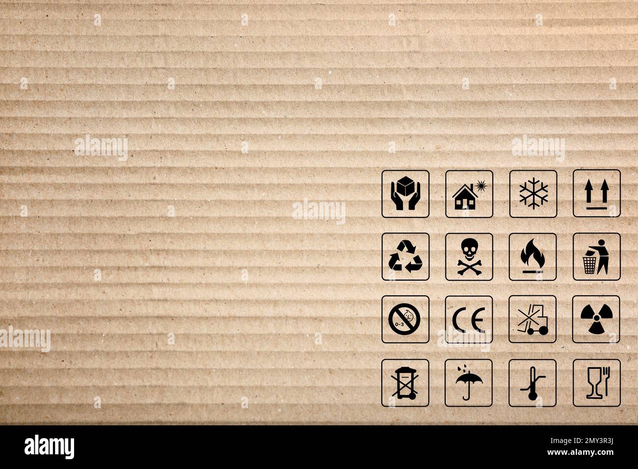 Cardboard box with packaging symbols as background, closeup Stock Photo ...