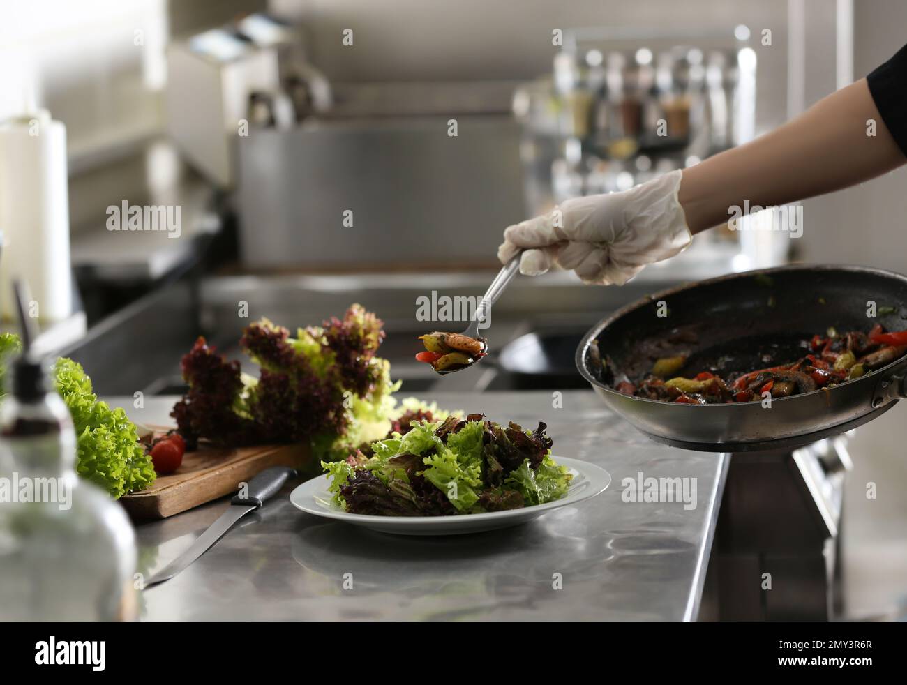 Female chef cooking tasty hi-res stock photography and images - Alamy