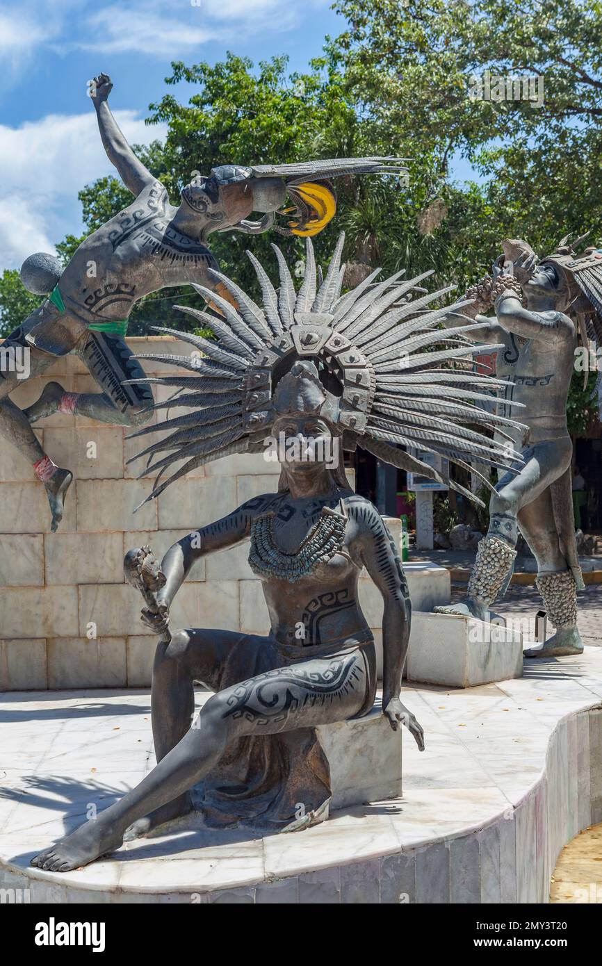 Bronze statue group depicting Mayan heroic figures, Playa del Carmen ...