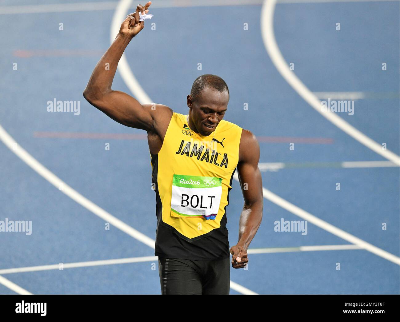Usain Bolt from Jamaica celebrates winning the gold medal in the men's ...