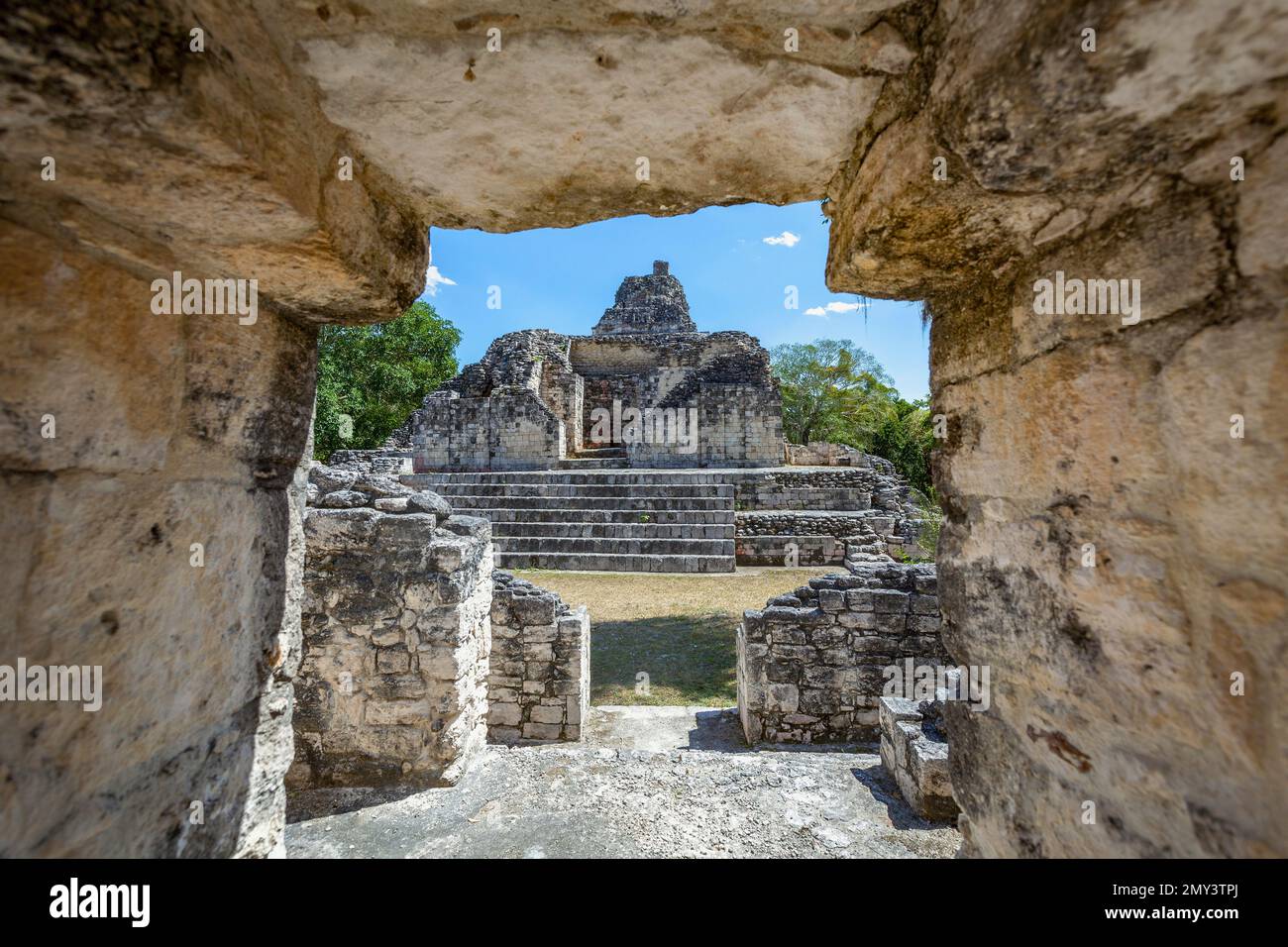 Structure X of the Mayan ruins at Becán, viewed through a narrow ...