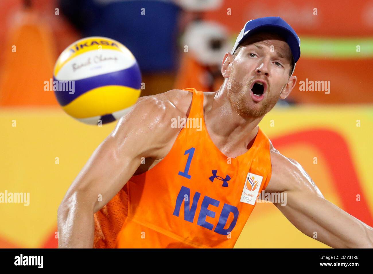 Netherlands' Alexander Brouwer misses a ball while playing against ...