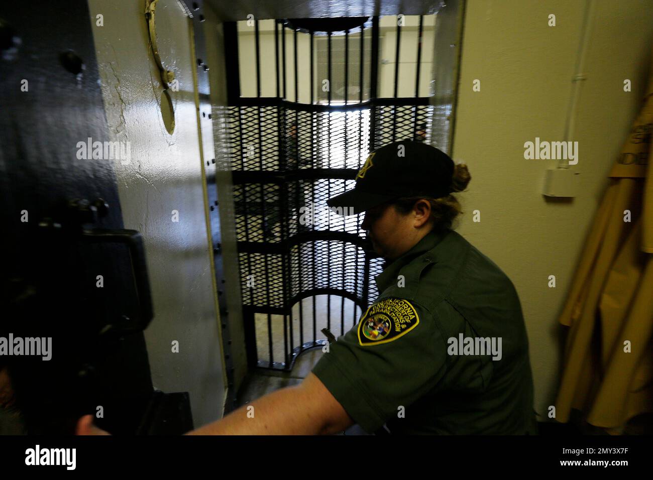 A guard opens an entrance to the north segregation section of death row ...
