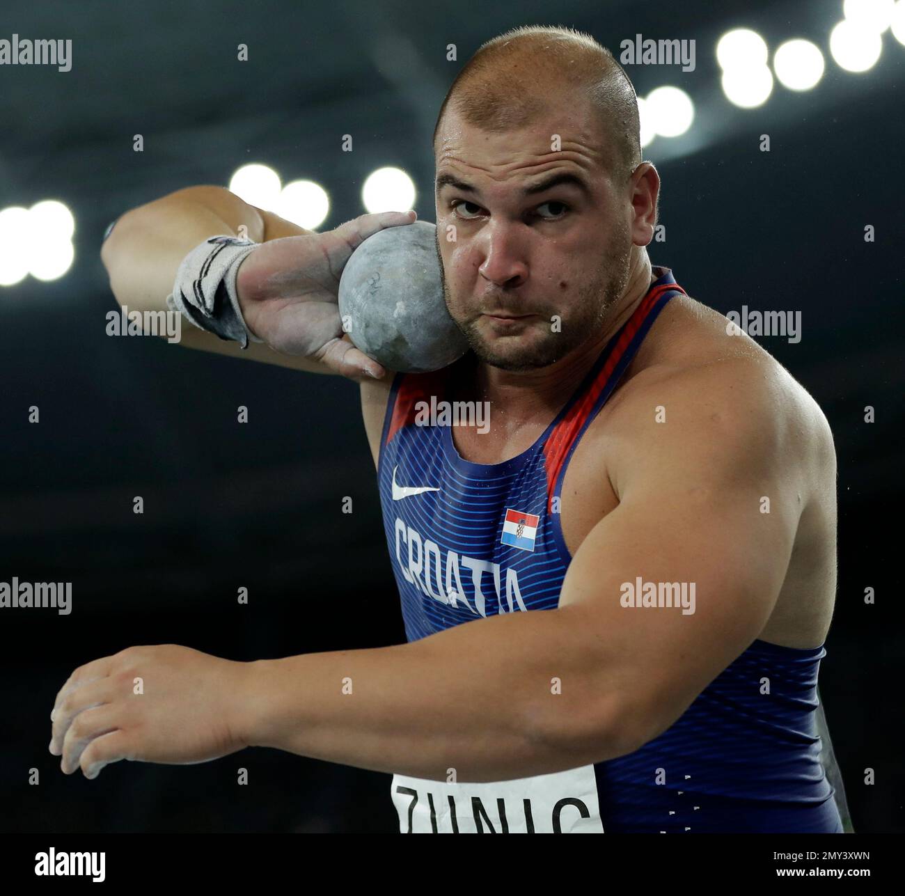 Croatia's Stipe Zunic makes an attempt in the men's shot put final ...