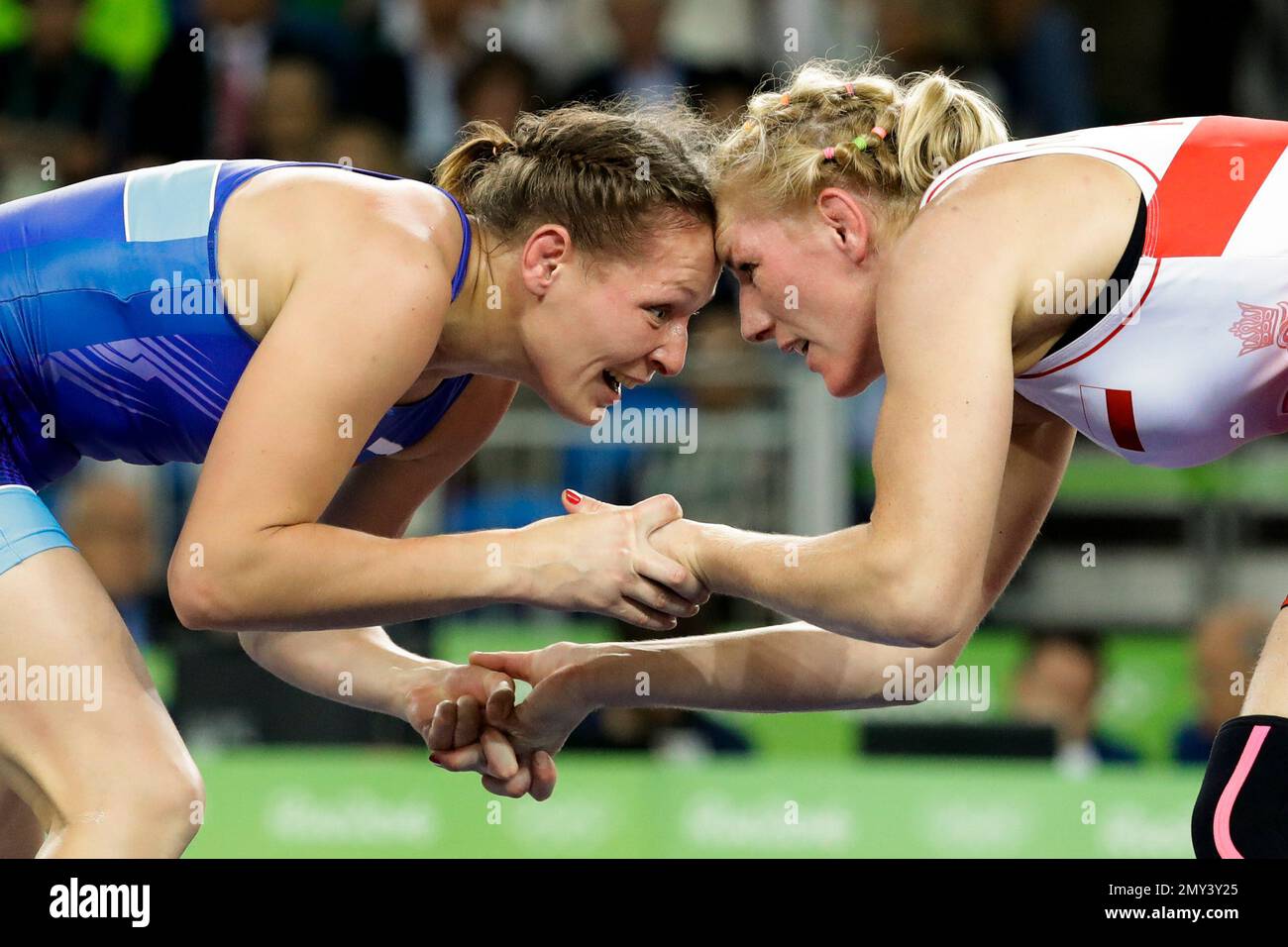 Poland's Monika Ewa Michalik, right, competes against Russia's Inna ...