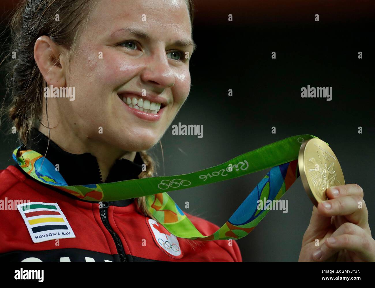 Canada's Erica Elizabeth Wiebe stands on the podium after winning the ...
