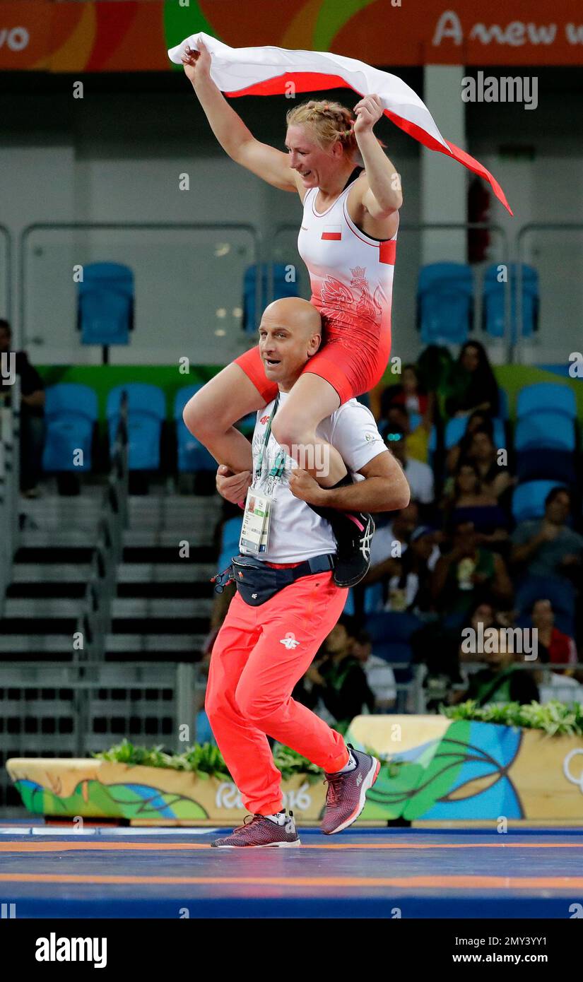 Poland's Monika Ewa Michalik celebrates after beating Russia's Inna ...