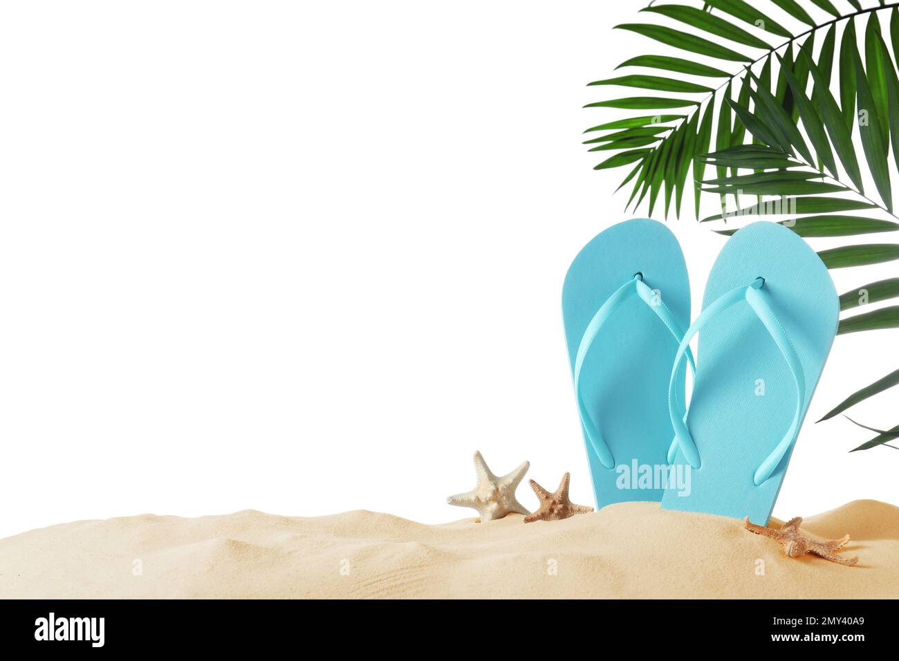 Light blue flip flops and starfishes on sand against white background. Beach objects Stock Photo ...