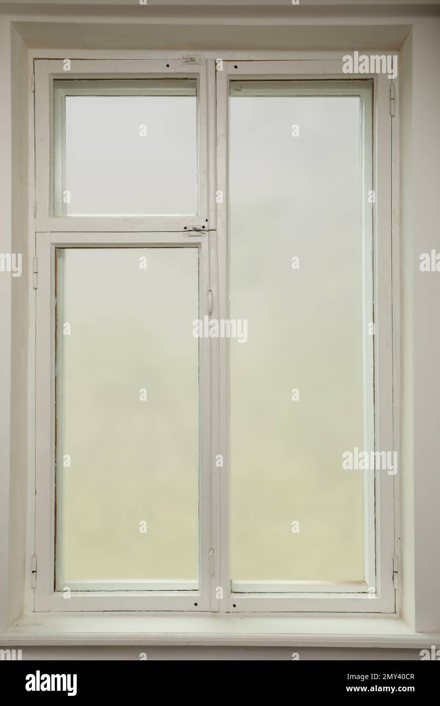 Old white window with wooden sill in room Stock Photo - Alamy