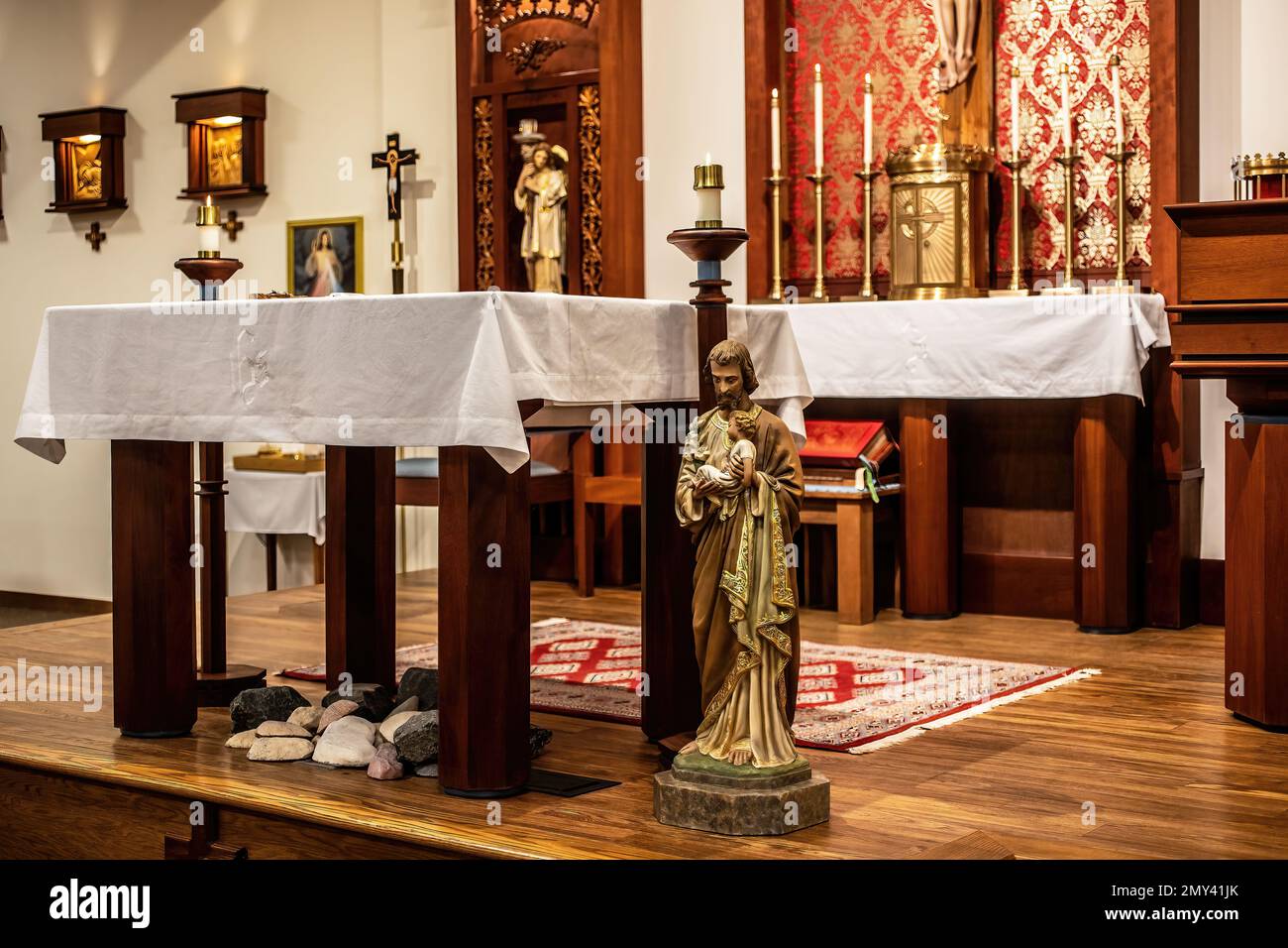 Statue of St. Joseph and baby Jesus with the altar at the feast of St ...