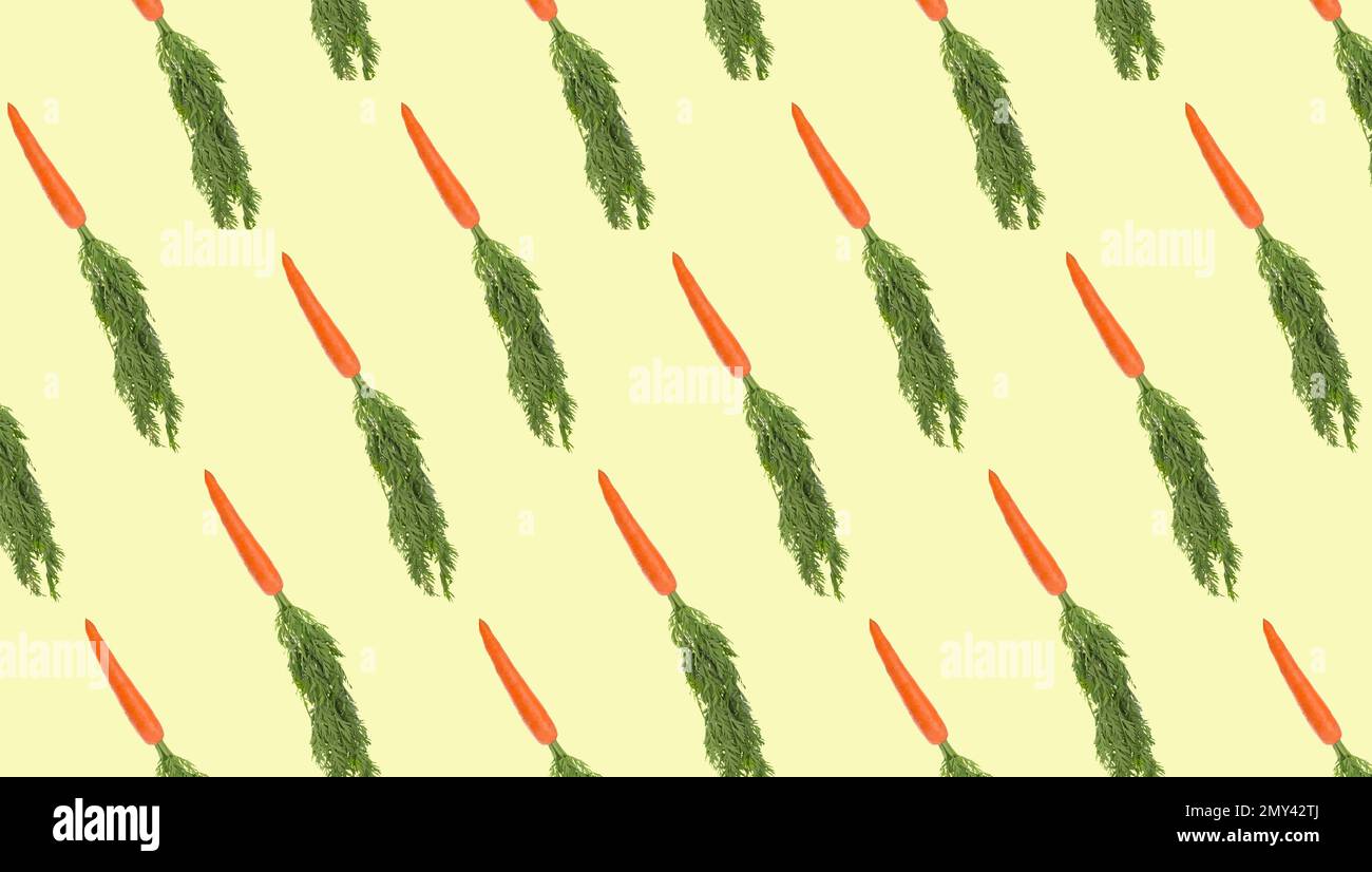 Whole carrots on pale yellow background, banner. Pattern design Stock ...