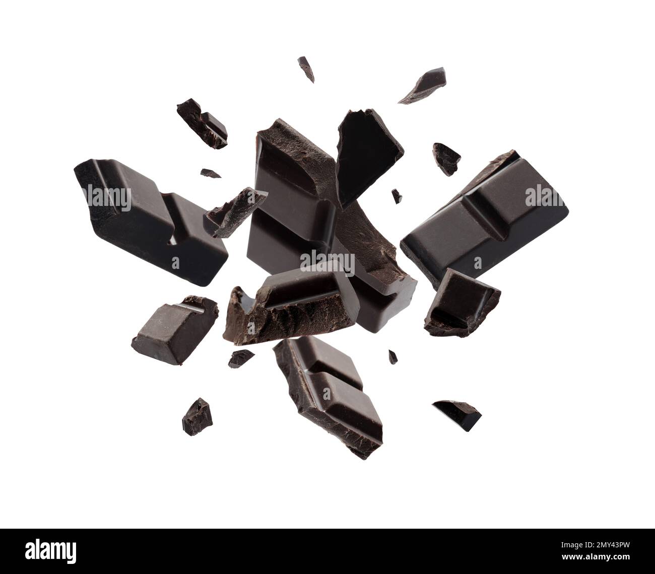 Dark chocolate explosion, pieces shattering on white background Stock ...