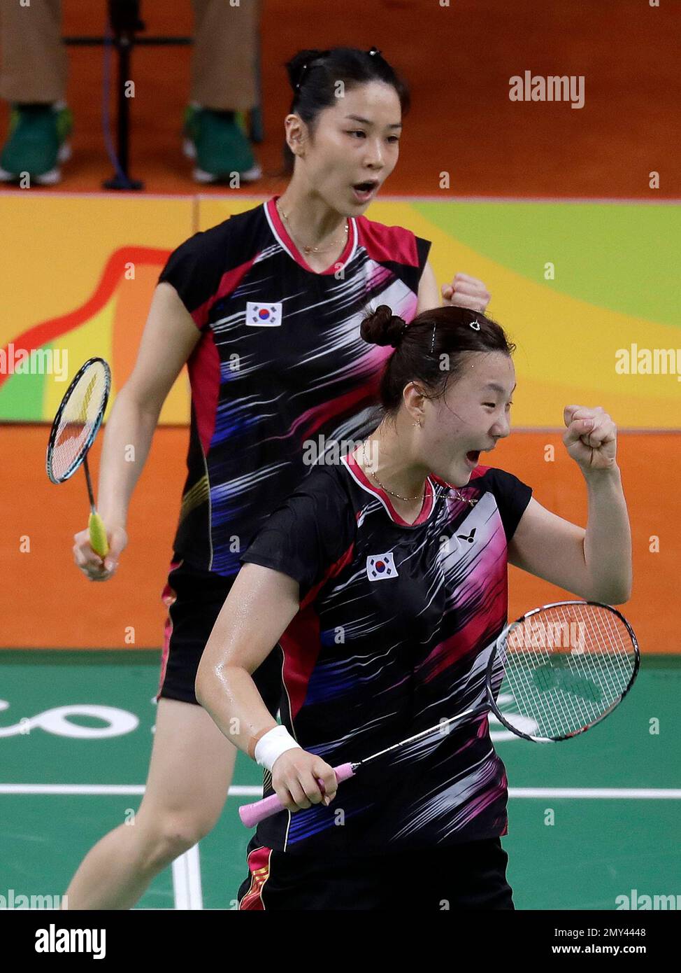 South Korea's Shin Seung-Chan, front, and Jung Kyung-Eun react to a ...