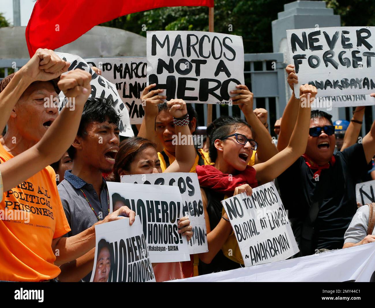 Protesters shout slogans during a rally at the gates of the Heroes ...