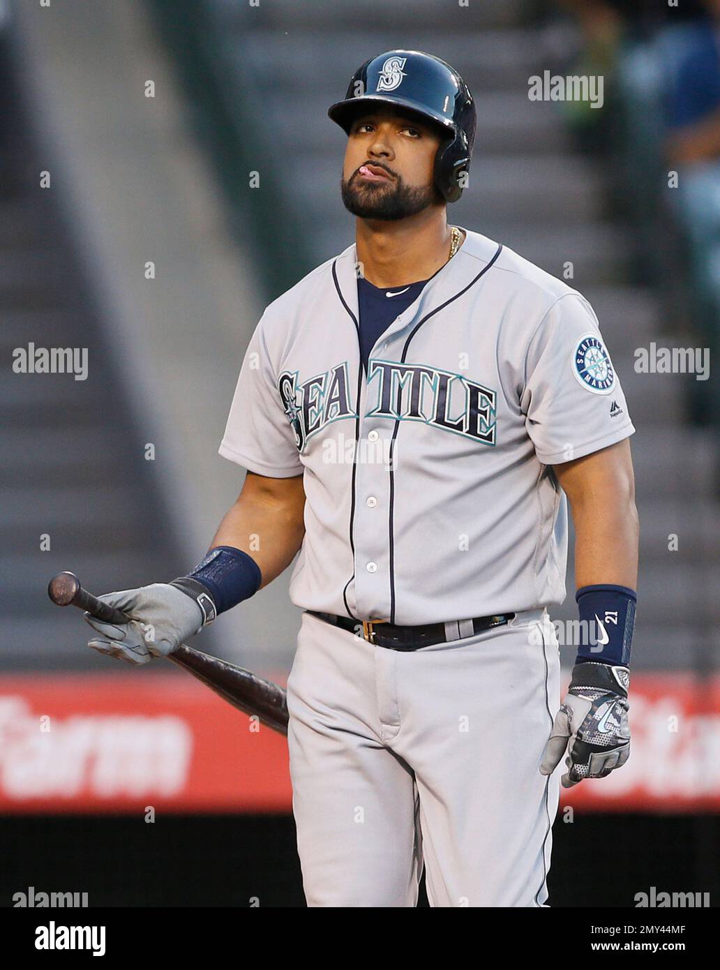 Seattle Mariners right fielder Franklin Gutierrez reacts after striking ...