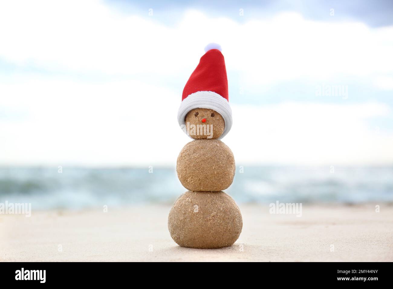 Snowman made sand on beach hi-res stock photography and images - Alamy