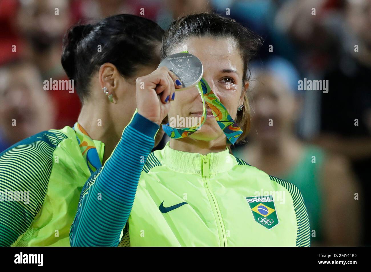 Barbara Seixas de Freitas celebrates on the podium alongside teammate ...