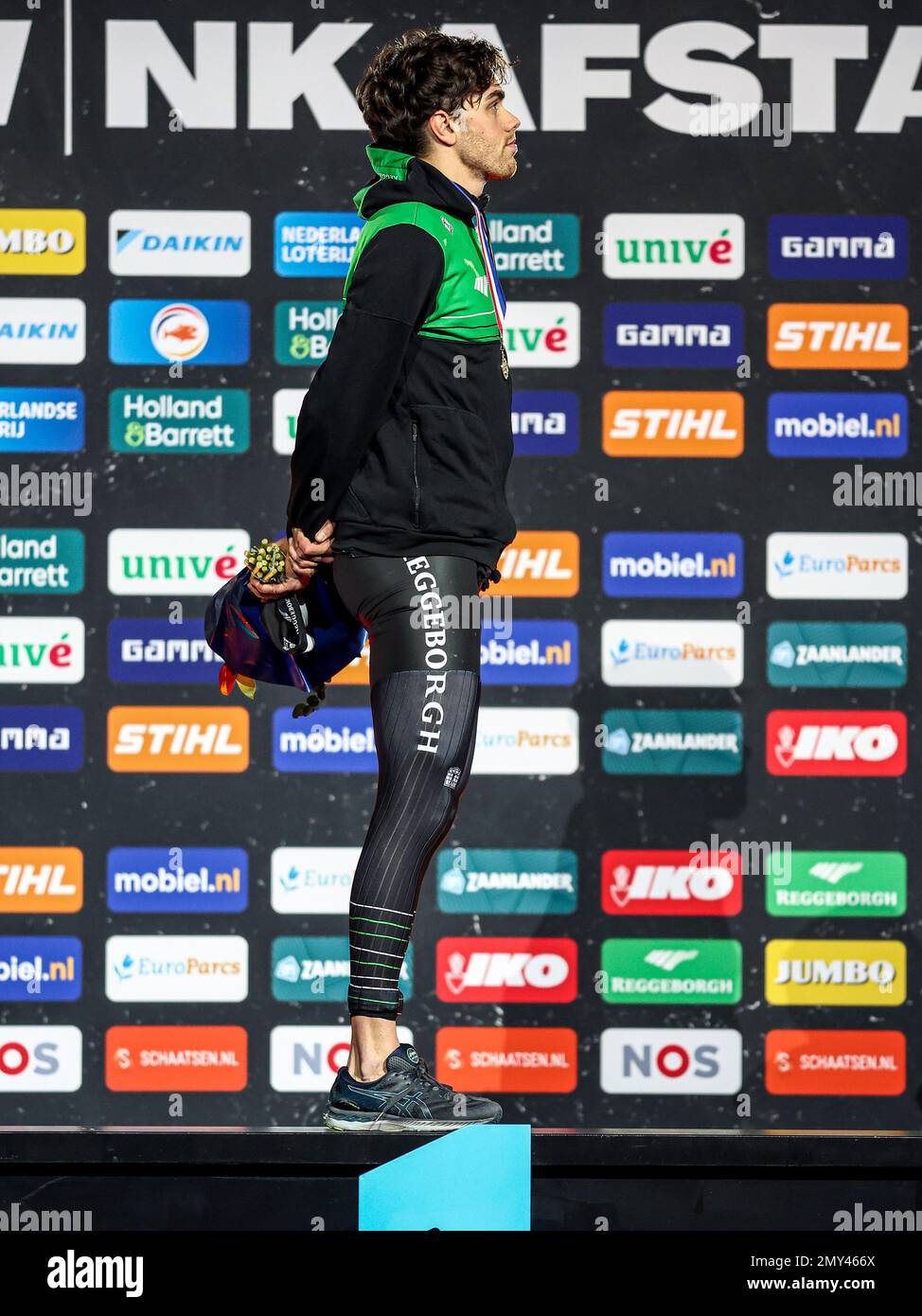 HERENVEEN - Patrick Roest on the podium after the 1500 meters during ...