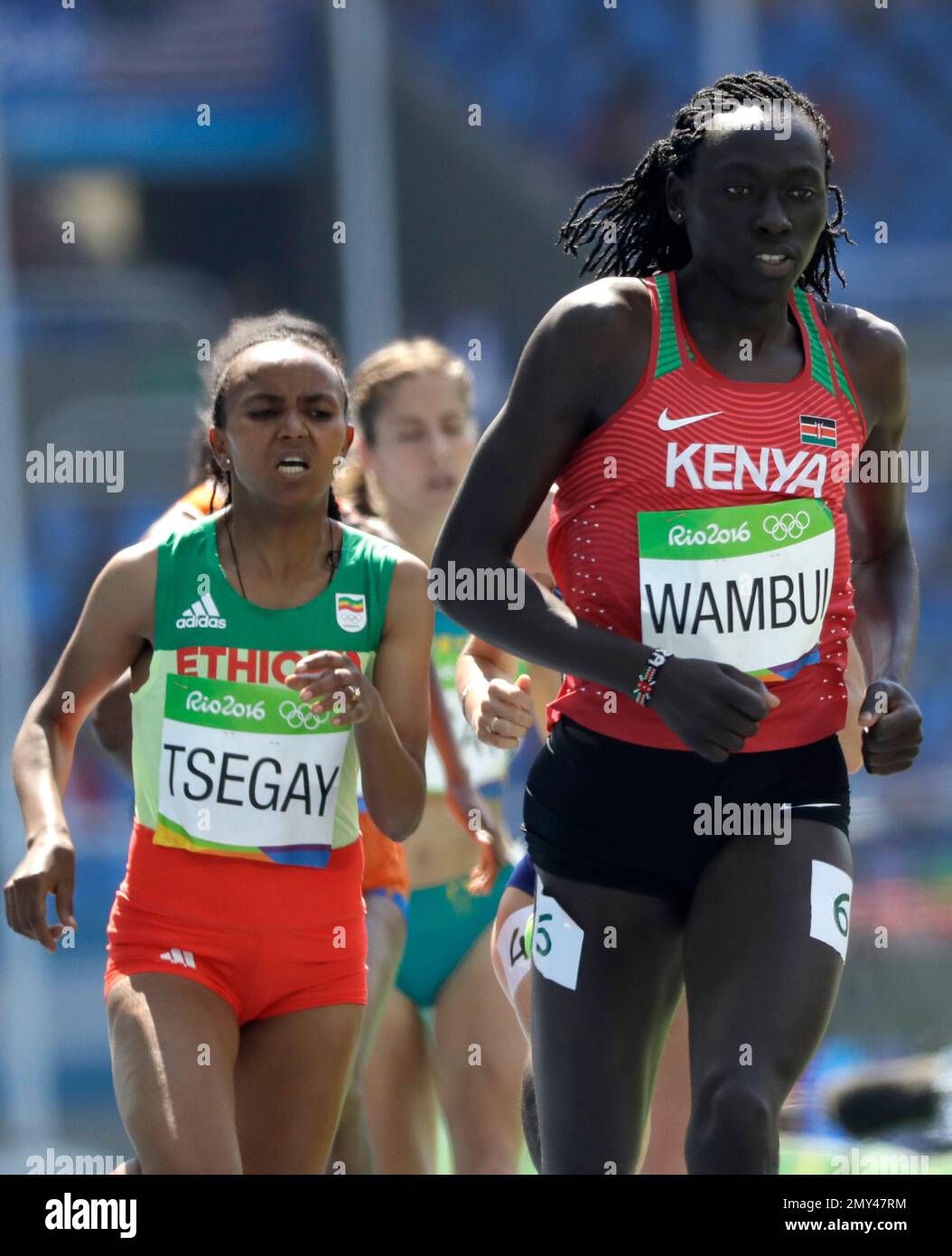 Kenya's Margaret Wambui, right, and Ethiopia's Gudaf Tsegay compete in ...