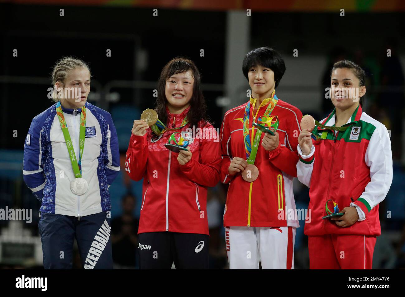 Azerbaijan's Mariya Stadnik, silver medalist, from left, Japan's Japan ...