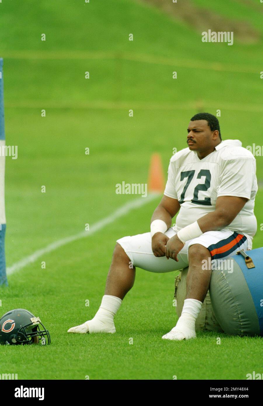 William "Refrigerator" Perry of the Chicago Bears takes a break before ...
