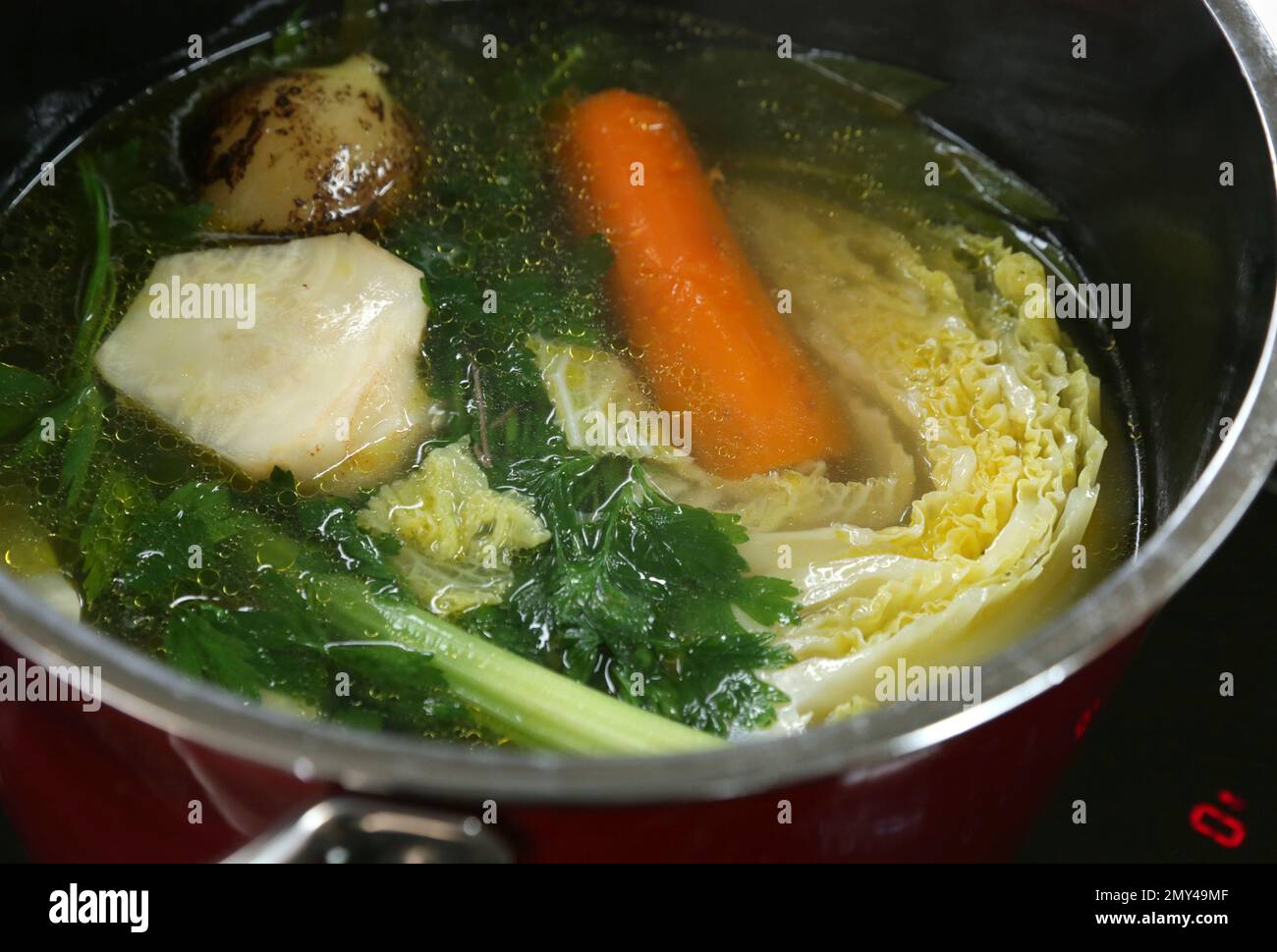 Saucepan with Vegetables in boiling water Stock Photo - Alamy