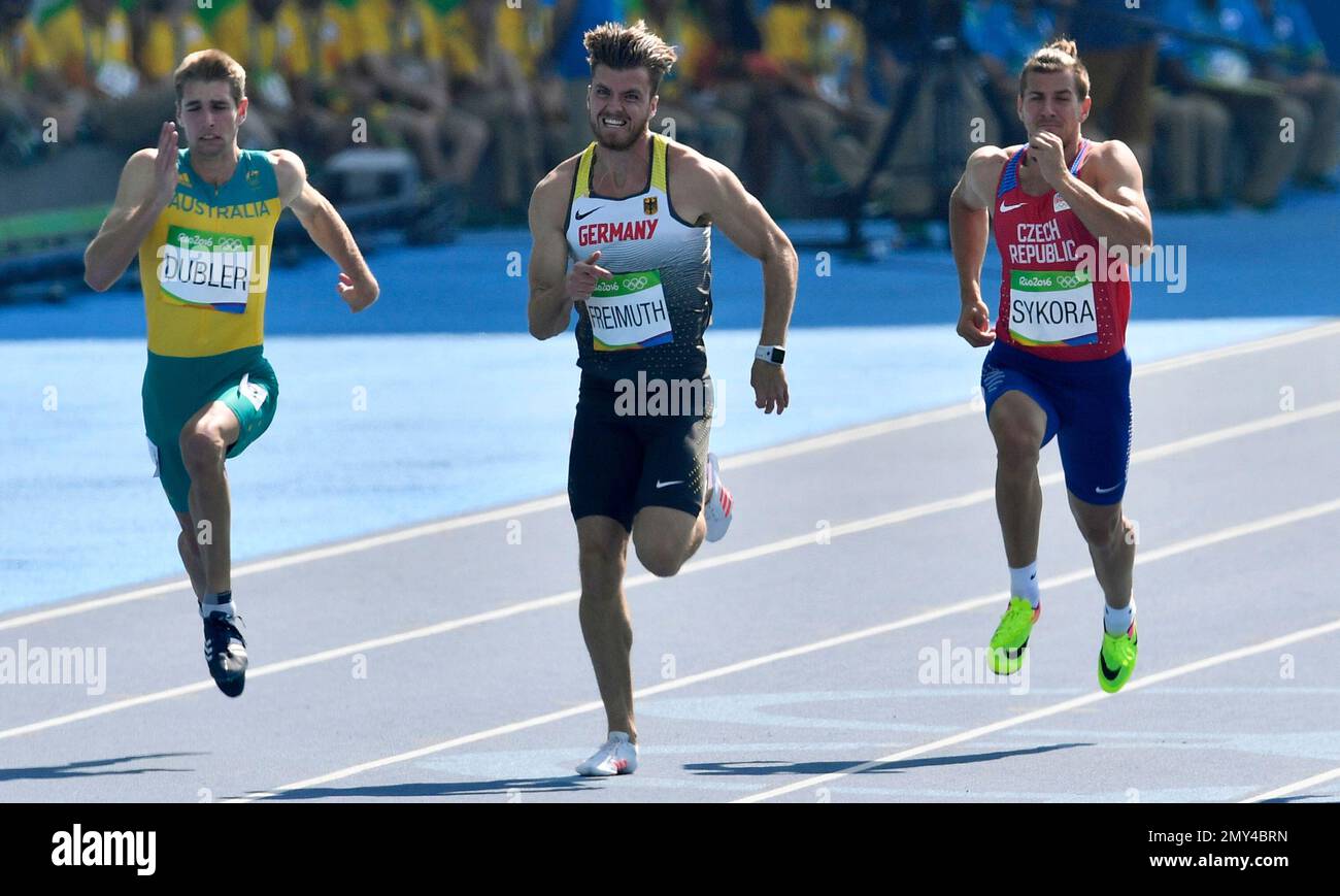 Australia's Cedric Dubler, left, Germany's Rico Freimuth, center, and ...