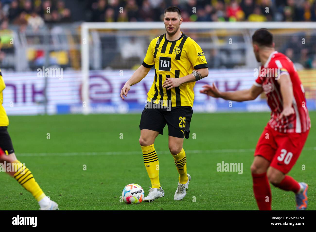 DORTMUND, GERMANY - FEBRUARY 4: Niklas Sule of Borussia Dortmund during ...