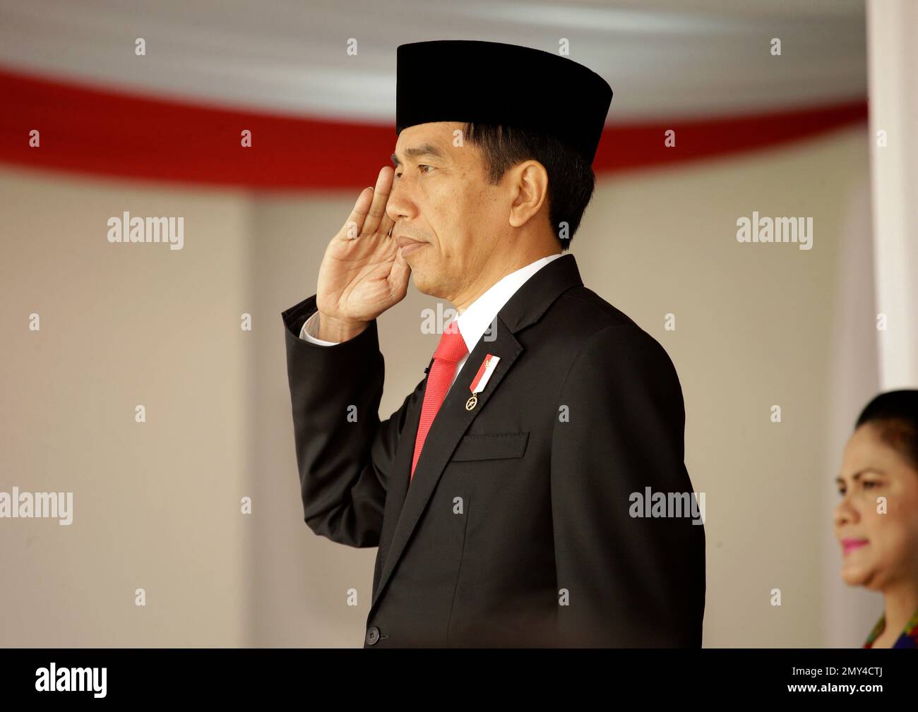 Indonesian President Joko Widodo salutes during a flag hoisting ...