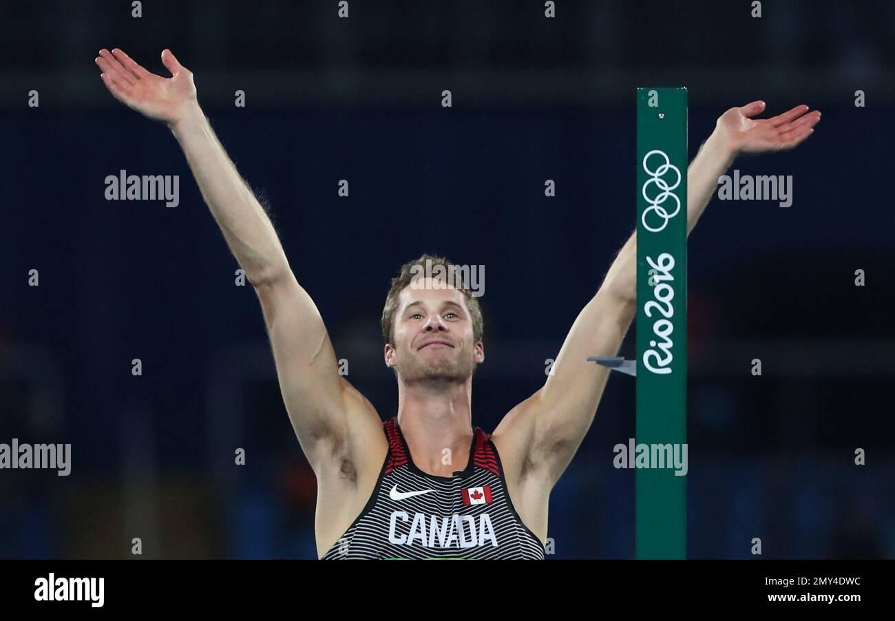 Canada's Derek Drouin celebrates in the men's high jump final, during ...