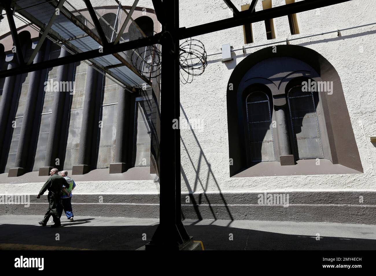 A condemned inmate is led back to his cell on death row at San Quentin ...