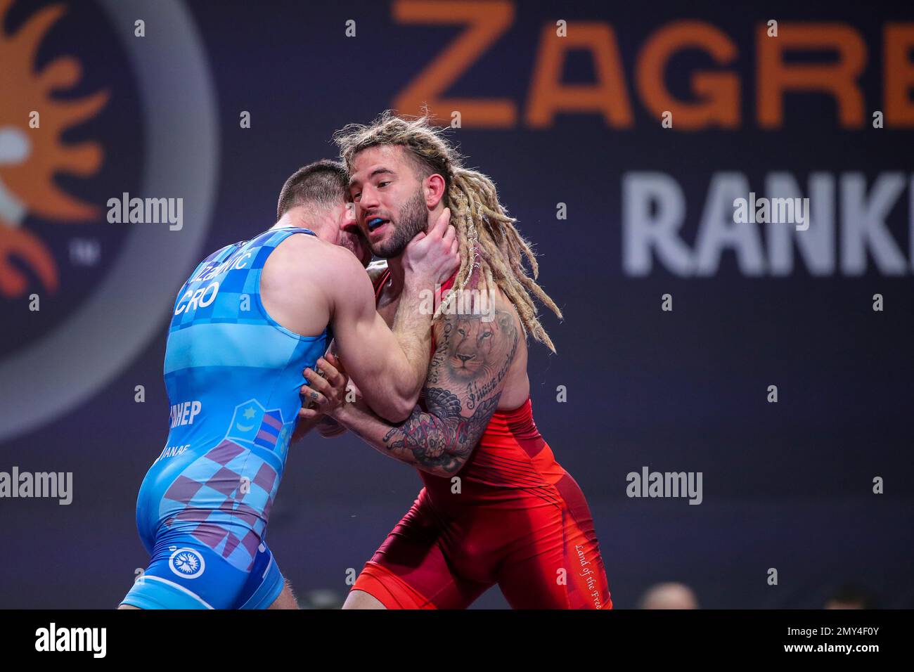 ZAGREB, CROATIA – FEBRUARY 04: Samuel Lee Jones of USA (red) competes ...