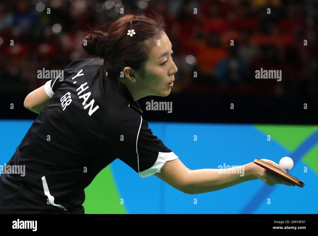 Germany's Han Ying returns a shot against China's Li Xiaoxia in the ...