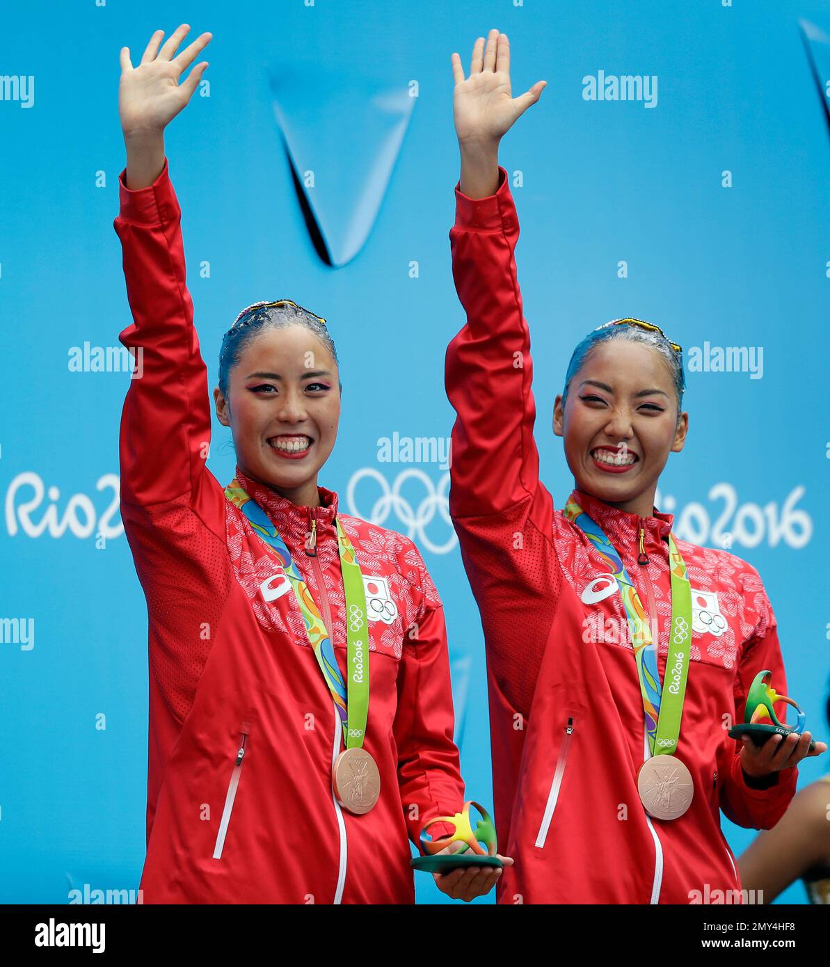 Japan's bronze medalists Yukiko Inui and Risako Mitsui wave during the ...