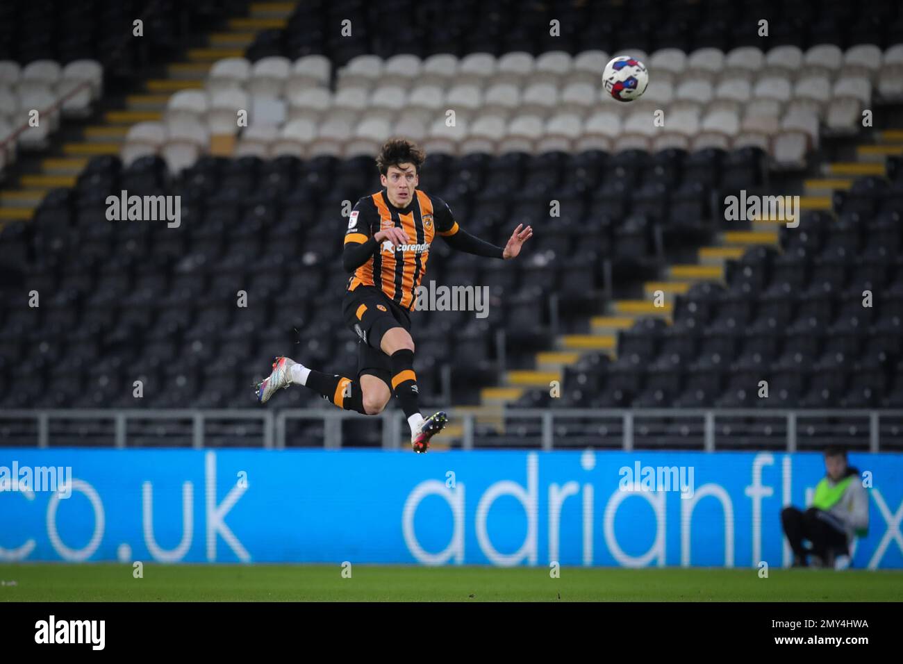 Alfie Jones #5 of Hull City heads the ball during the Sky Bet ...