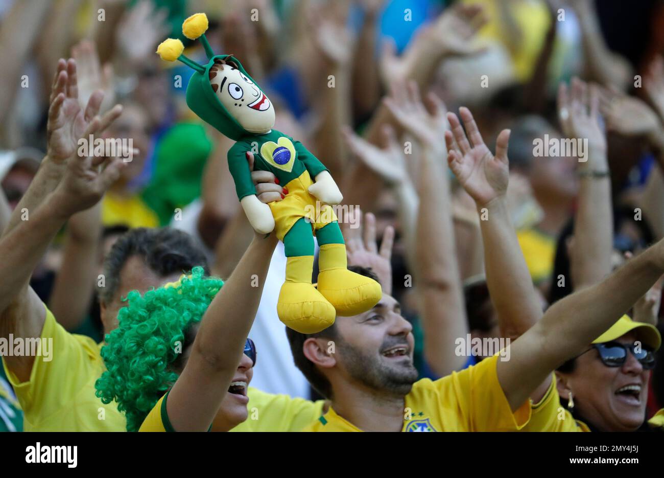 Spectators cheer during a semi-final match of the women's Olympic ...