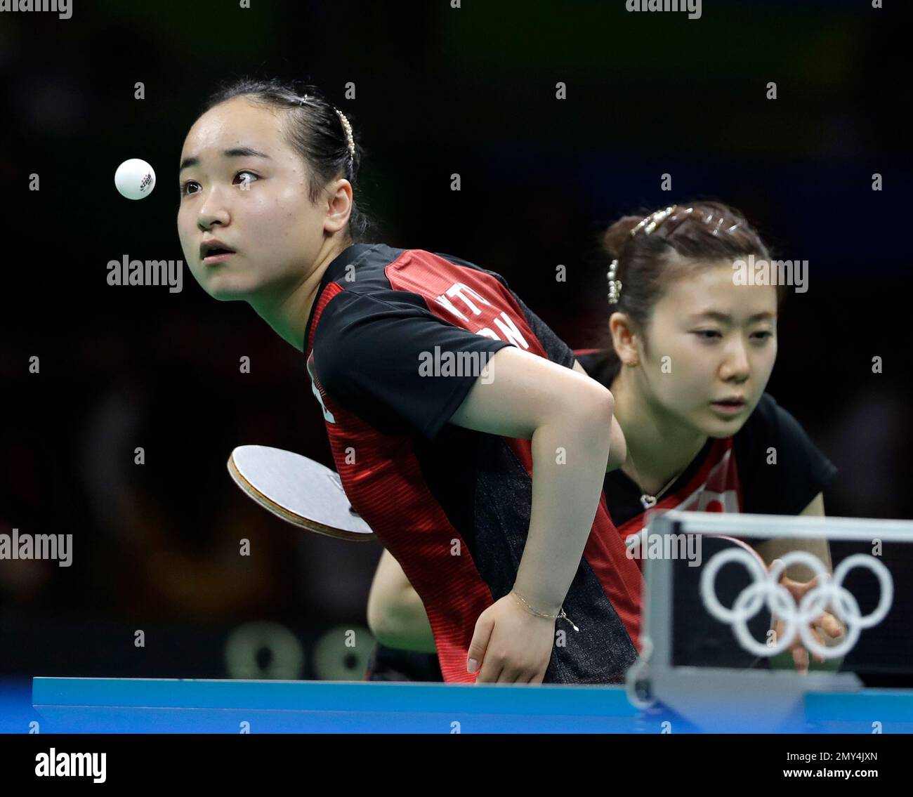 Japan's Mima Ito and Ai Fukuhara play against Singapore's Yu Mengyu and ...