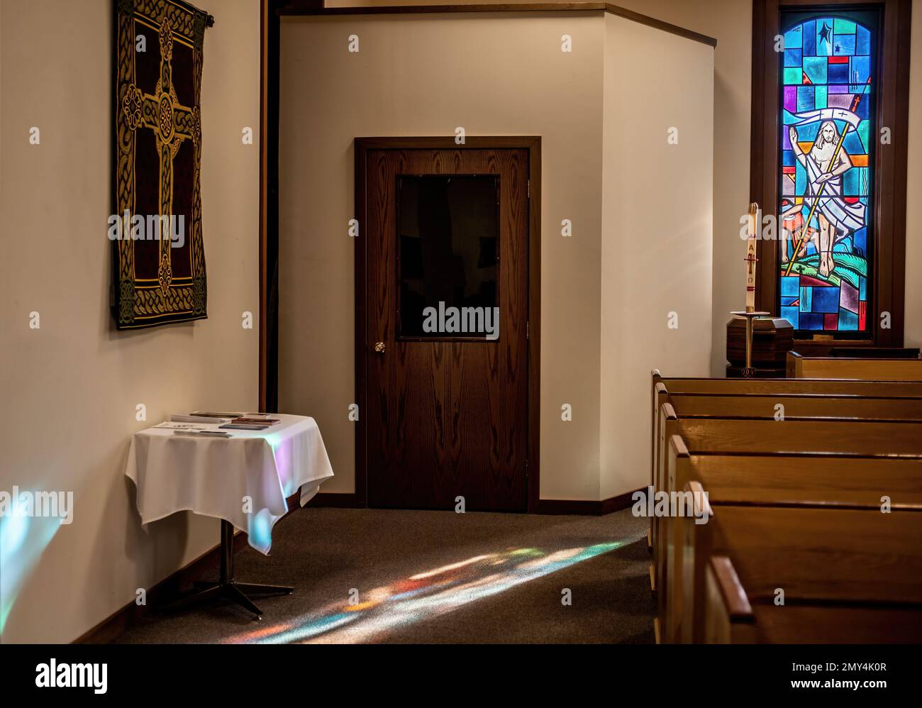 Colored lights streaming into St. Joseph's Catholic Church through the ...