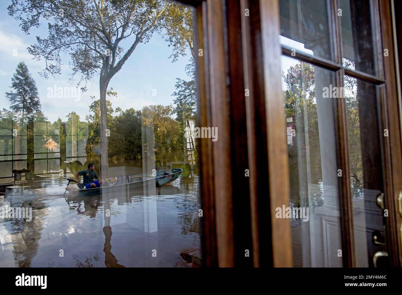 David Key arrives at his flooded home in Prairieville, La., Tuesday ...