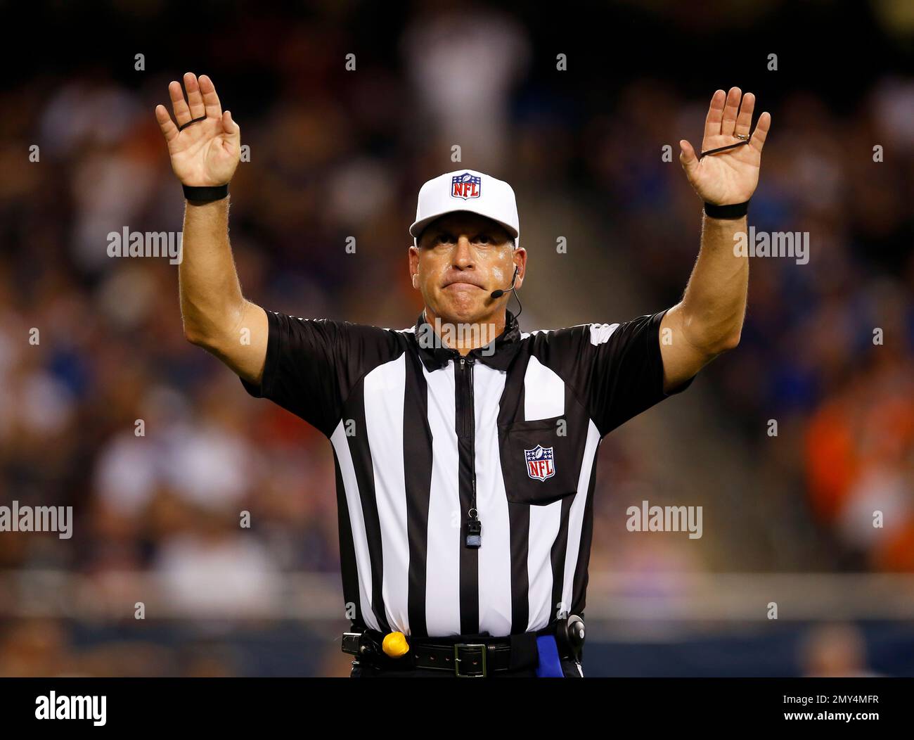 NFL referee John Hussey signals time out during an NFL preseason ...