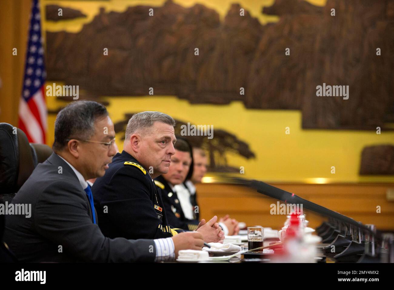 U.S. Army Chief of Staff Gen. Mark Milley, second from left, listens ...