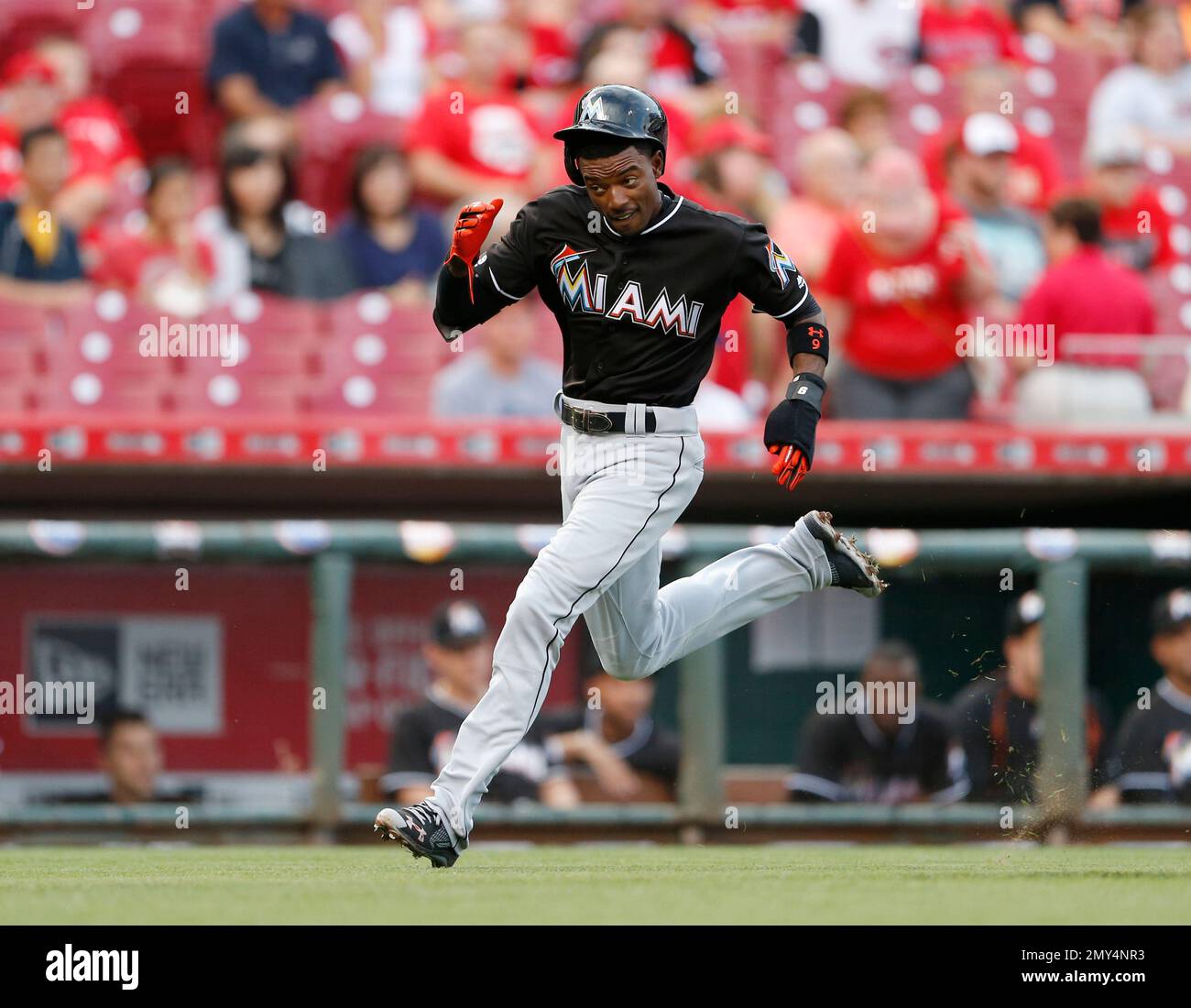Miami Marlins' Dee Gordon scores on on a Martin Prado single against ...