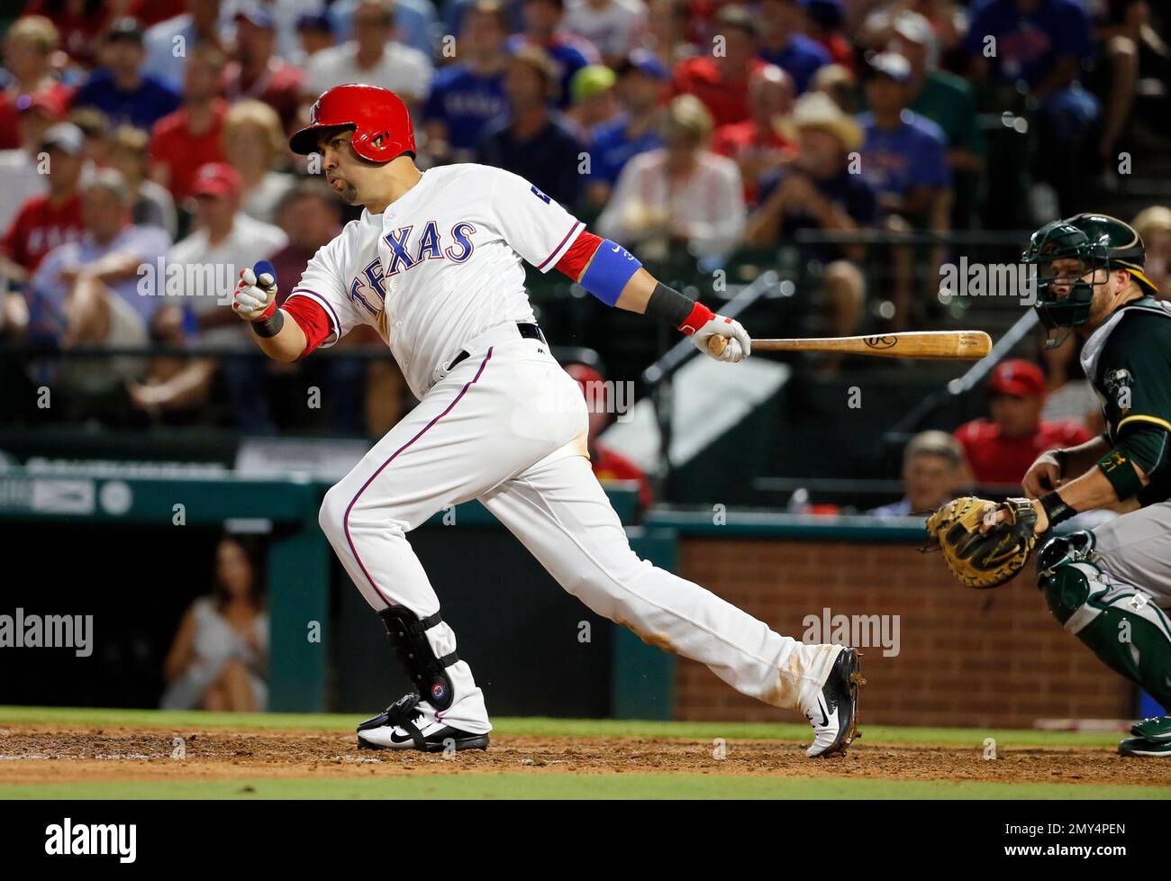 Texas Rangers' Carlos Beltran follows through on a single to left off a ...