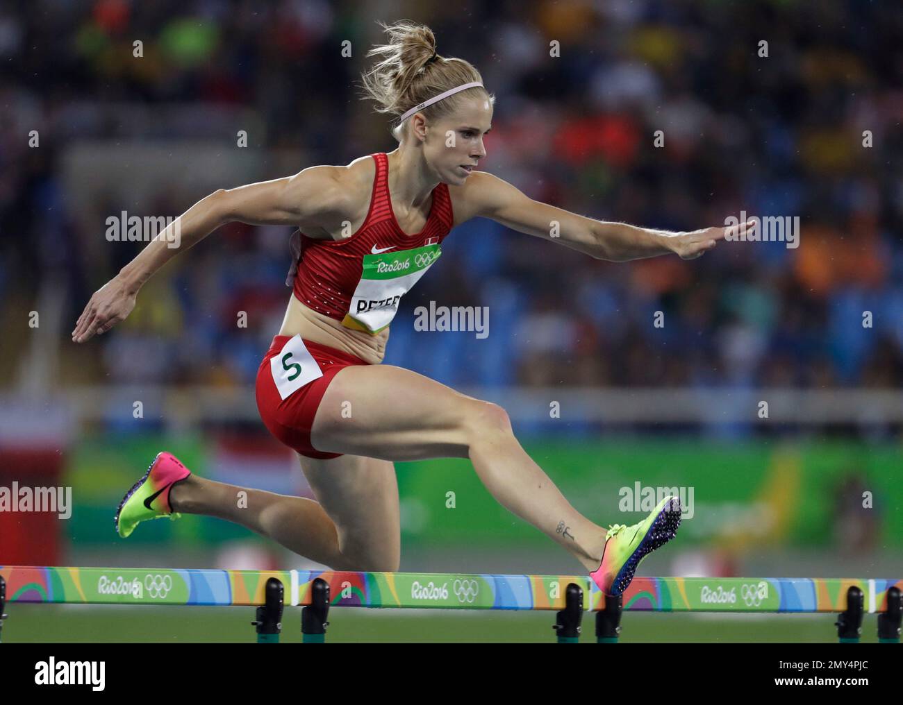 Denmark's Sara Slott Petersen competes in a women's 400-meter hurdles ...